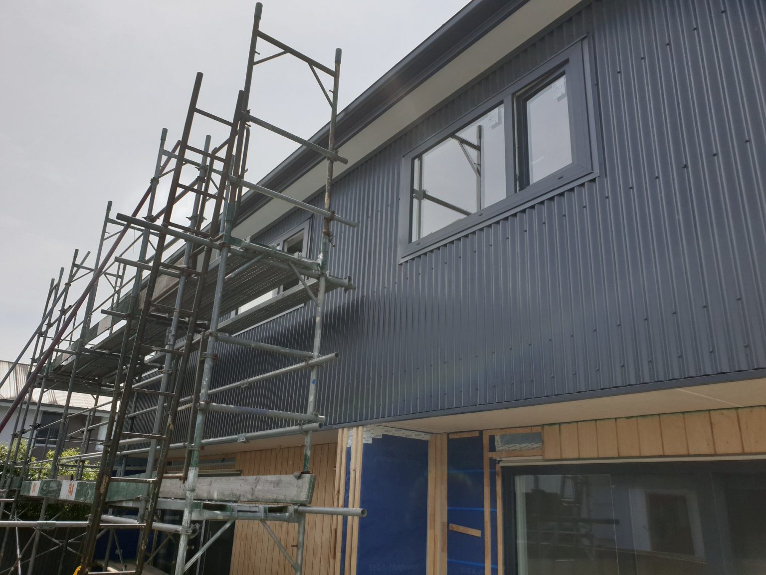 Corrugated Iron Cladding for Apartment Development - Roofline Canterbury